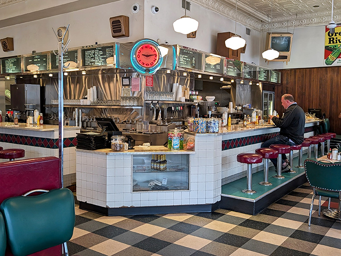 The counter seats offer front-row tickets to the culinary theater happening behind that gleaming kitchen pass.