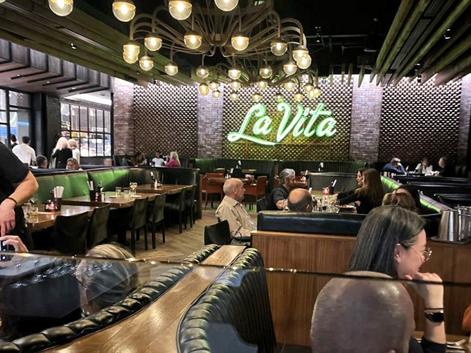 The "La Vita" sign isn't just decor&mdash;it's truth in advertising for a dining room where the good life happens one bite at a time.