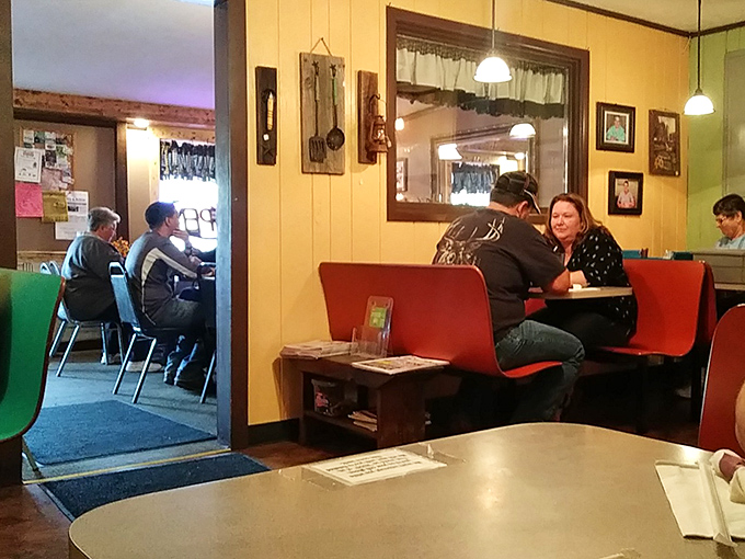 Where strangers become neighbors over coffee and conversation. In the age of smartphones, these booths still host the original social network.