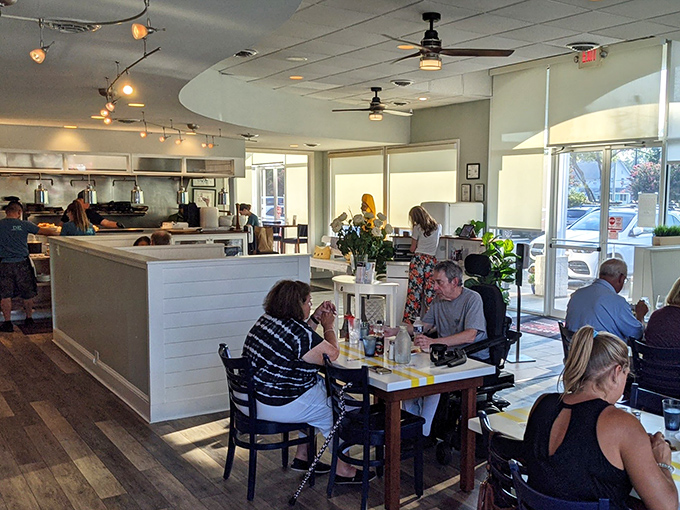 Where locals and tourists break bread together. The bright, airy space invites lingering conversations over just one more bite.