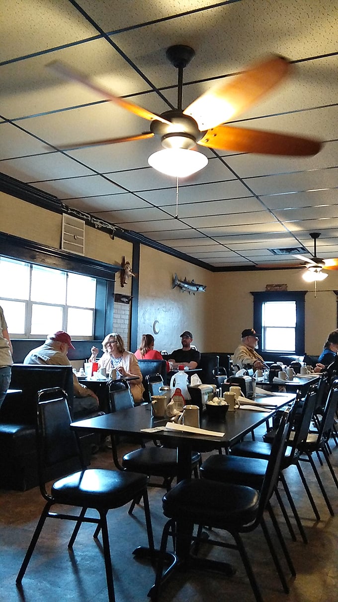 The dining room hums with the beautiful symphony of forks against plates and stories being shared. This is community in its most delicious form.