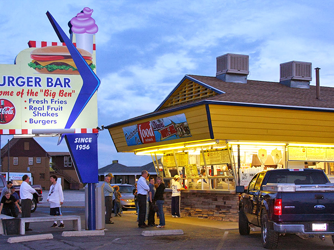 As the sun sets, Burger Bar's neon glow becomes a lighthouse for the burger-obsessed. The line says everything you need to know.