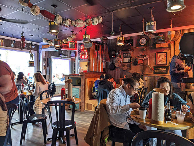 Where strangers become friends over shared appreciation of perfectly fried fish. The universal language of "mmm" needs no translation in this cozy spot.