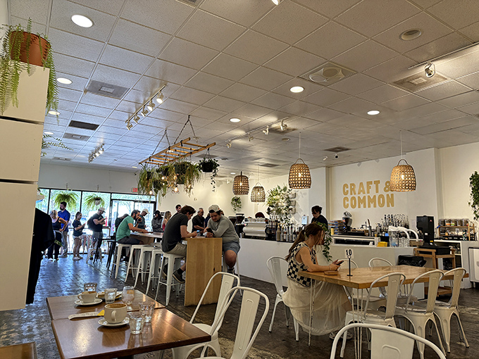 The bustling interior speaks volumes&mdash;locals know where to find the good stuff. White chairs and wooden tables create a canvas for culinary joy.