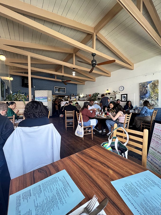 Where strangers become temporary neighbors, united by the universal language of "pass the hot sauce, please."