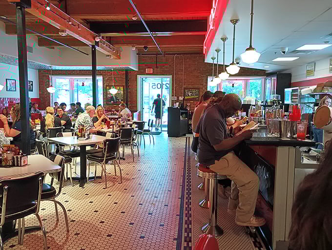 The counter seats fill with regulars and first-timers alike, all united in the universal language of "mmm" and "you've got to try this."