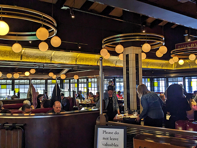 A bustling dining room where conversations flow as freely as the coffee, proving good food brings people together better than any social media app.