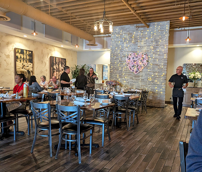 A bustling dining room where memories are made between bites, and servers navigate the space like choreographed dancers in a culinary ballet.