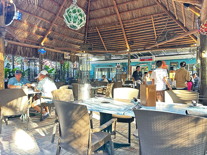 Under the thatched roof, conversations flow as freely as the drinks, creating that perfect Keys atmosphere of relaxed indulgence.