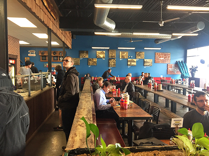 Patrons focused on their plates with the concentration of surgeons. Good barbecue demands your full attention.