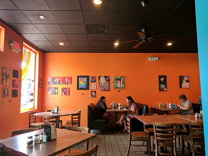 Local artwork adorns the walls, giving diners something to admire between bites of pizza perfection.