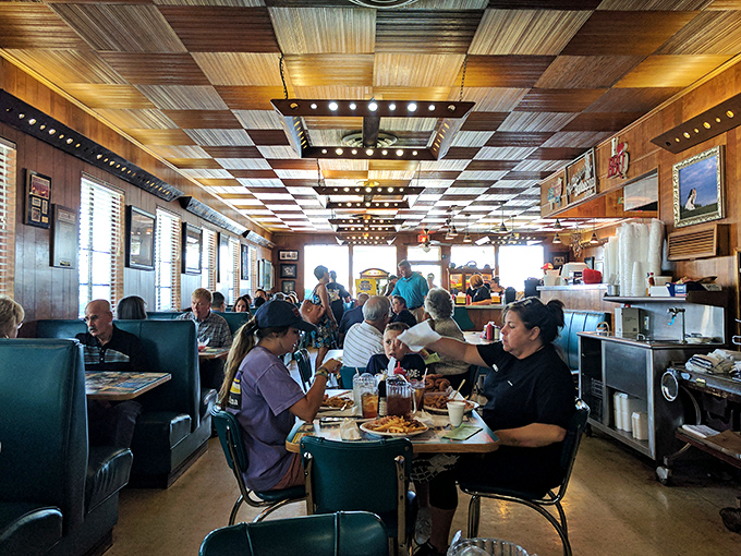 Bridges doesn't just serve customers; it hosts a daily community gathering where strangers become neighbors over plates of barbecue.