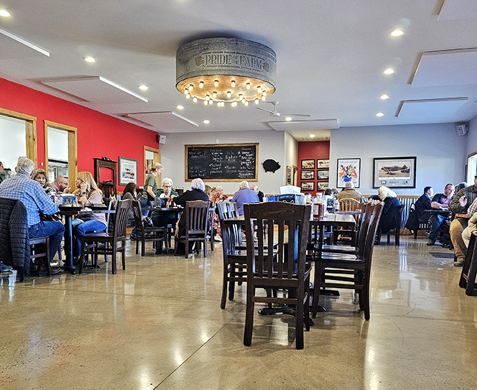 The dining room buzzes with the happy murmur of barbecue pilgrims who've found their smoky sanctuary under a charming galvanized metal light fixture.