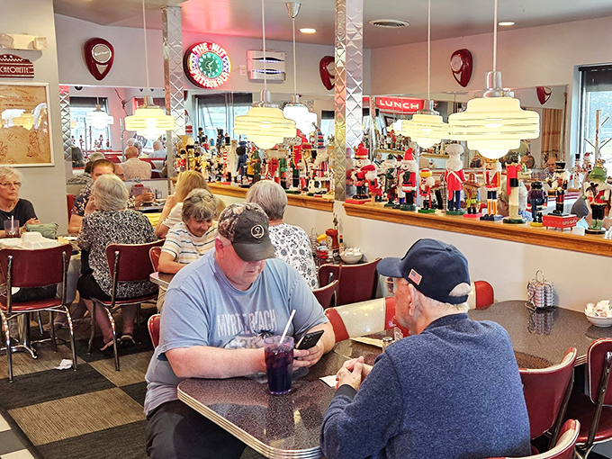 Where strangers become neighbors over coffee. The collection of nutcrackers watching from above has witnessed countless local stories unfold.