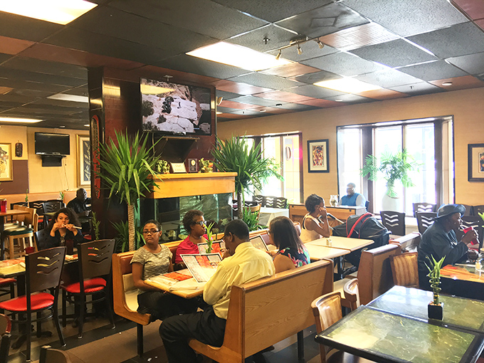 Families gather around tables at Chef Eddie's, creating memories seasoned with the same care as the food they're enjoying.