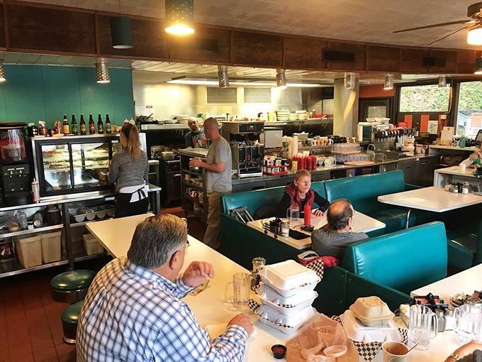 Where locals become regulars and regulars become family. The kind of place where your coffee cup never reaches empty before a friendly refill appears.