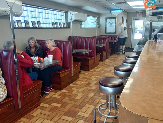 Regulars settle into booths worn smooth by decades of satisfied customers&mdash;these seats have heard more stories than a bartender.
