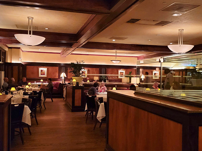 Evening at McKendrick's—where the glow of conversation rivals the warmth of the décor. Everyone looks like they're in on a delicious secret.