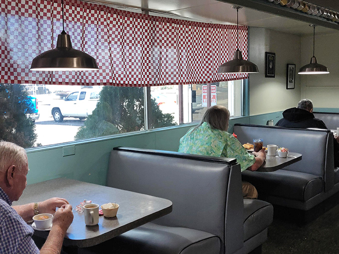 Classic diner booths&mdash;where family stories unfold over coffee refills and the world's problems get solved between bites of toast.