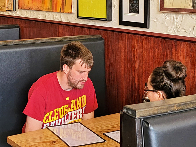 The cozy booth seating invites you to settle in and stay awhile&mdash;these aren't meals to be rushed, they're experiences to be savored.