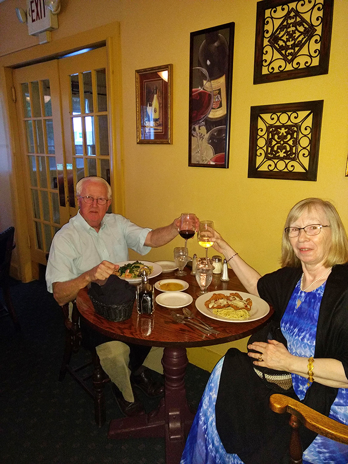 The restaurant's warm yellow walls and intimate tables create the perfect backdrop for celebrating life's special moments.