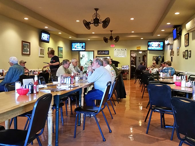 A bustling dining room where conversations flow as freely as the coffee, and everyone seems to know everyone else's business&mdash;in the best way possible.