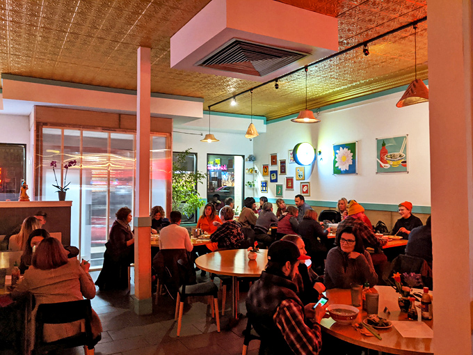 A packed house is always a good sign, especially when people look this content with their food choices and life decisions.