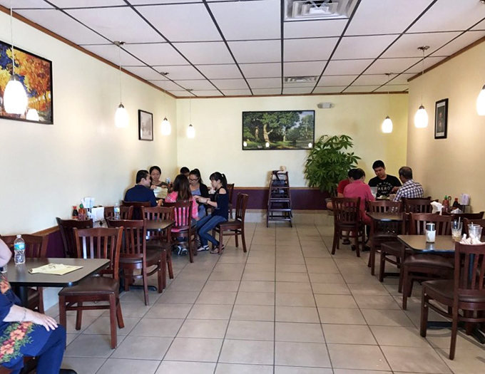 Local diners gathered around tables, lost in their bowls, proving that the best restaurants are always discovered through word of mouth.