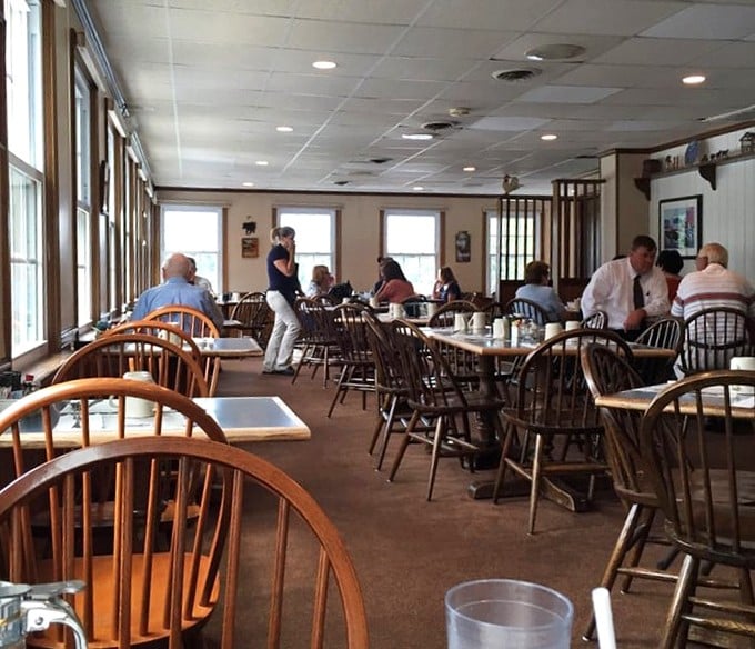 A bustling dining room where conversations flow as freely as the coffee, and nobody's checking their phone because the food demands full attention.
