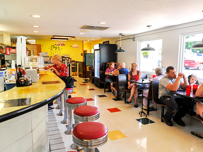 Families gather in booths while solo diners perch at the counter&mdash;a Norman Rockwell painting with better food.