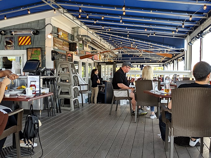 The outdoor deck&mdash;where conversations flow as freely as the wine and everyone's suddenly an expert on identifying passing boats.