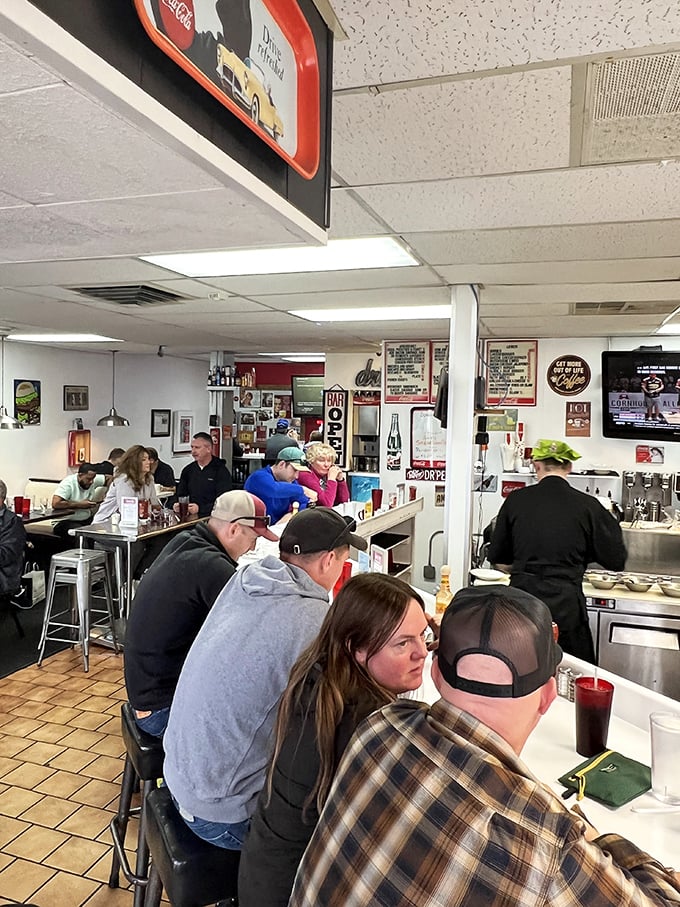 The counter at White Spot is where strangers become neighbors. Morning rituals play out as Anchorage wakes up over eggs and coffee.