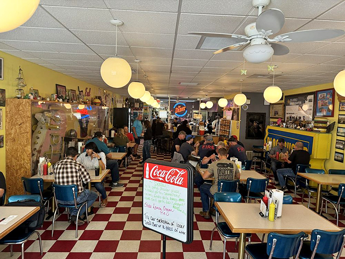 Where strangers become friends over shared burger appreciation. The packed house tells you everything you need to know about the food.