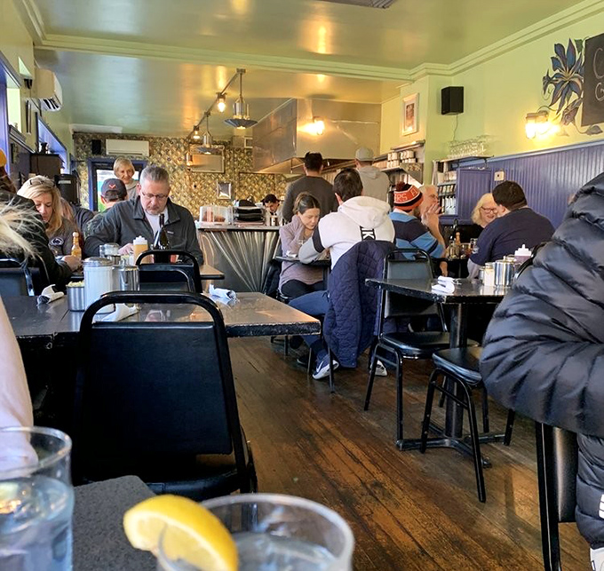 Where strangers become temporary breakfast companions, united by the universal language of "pass the hot sauce, please."
