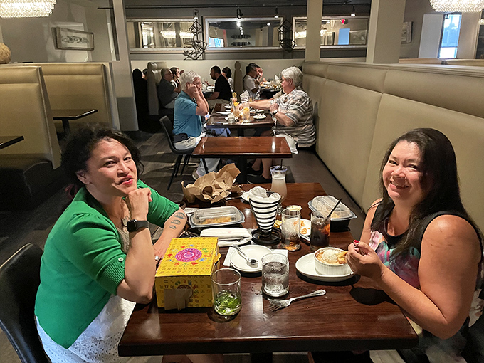 Happy diners caught in their natural habitat&mdash;that magical moment when good food transforms strangers into instant friends.