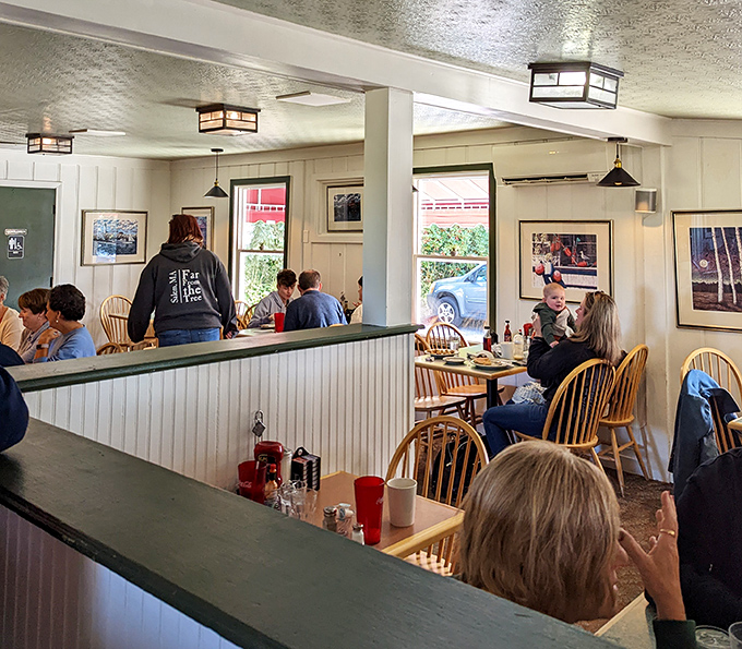 The dining room hums with conversation and clinking silverware. Every occupied table is a testament to food worth leaving home for.