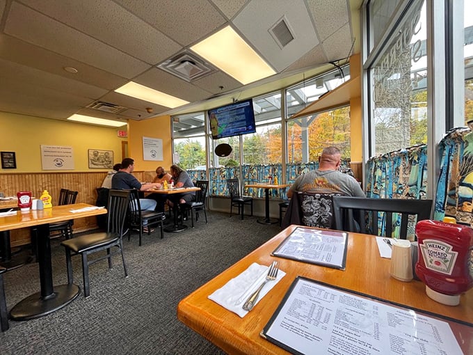 Happy diners experiencing that moment of reverent silence that follows the first bite of something truly exceptional.