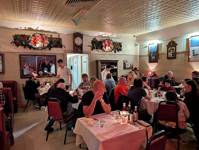 Where strangers become friends over sizzling plates and shared appreciation. The dining room hums with the universal language of "mmmmm."