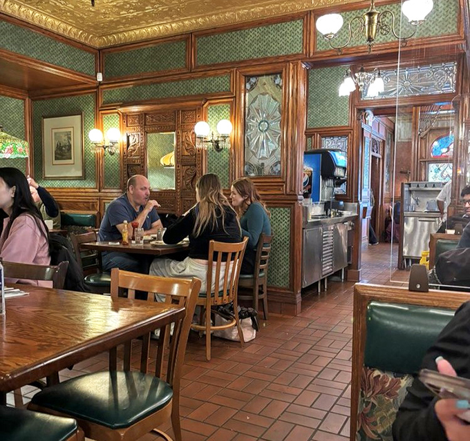 Breakfast conversations flow as freely as the coffee in this wood-paneled dining room where families have been making memories for generations.