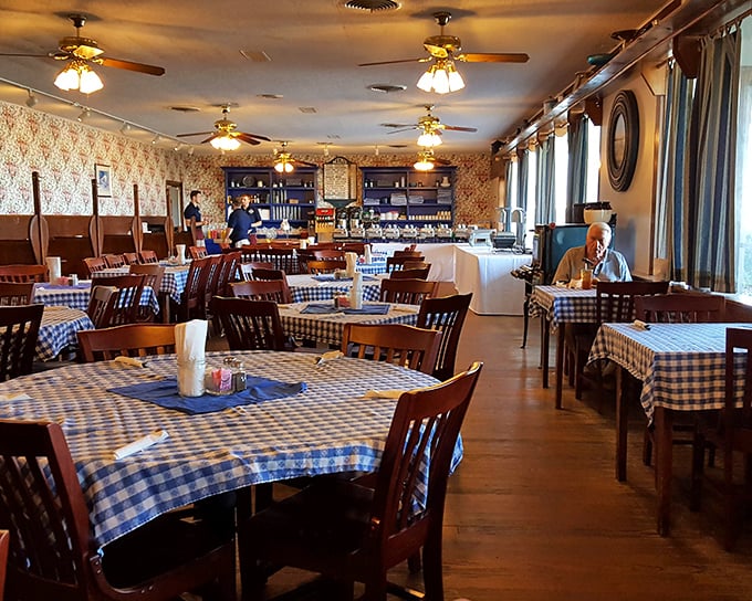 Another angle of the dining sanctuary. Those ceiling fans have witnessed countless "mmms" and "you've got to try this" moments across generations.