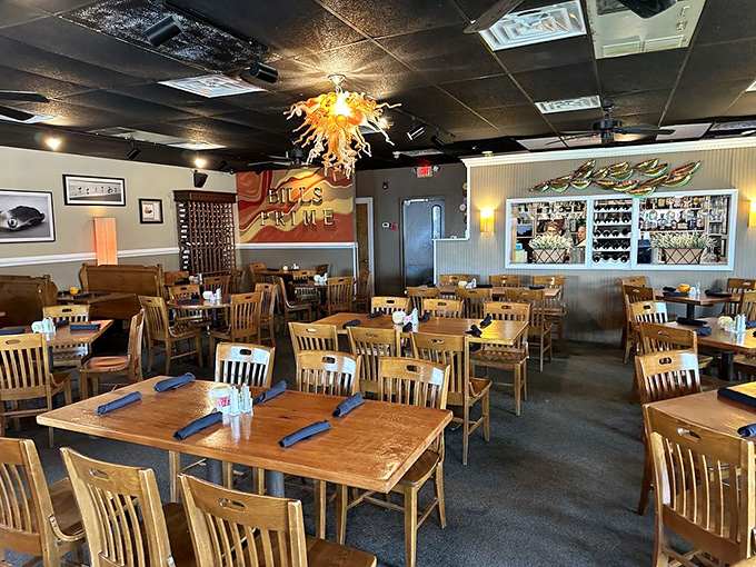 The dining room whispers "come as you are" while the amber chandelier adds just enough sparkle to make Tuesday night feel like Saturday.