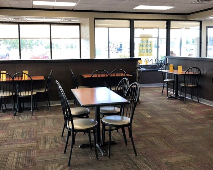 The dining area says, "Stay awhile, neighbor," with that classic small-town charm that makes everyone feel like a regular.