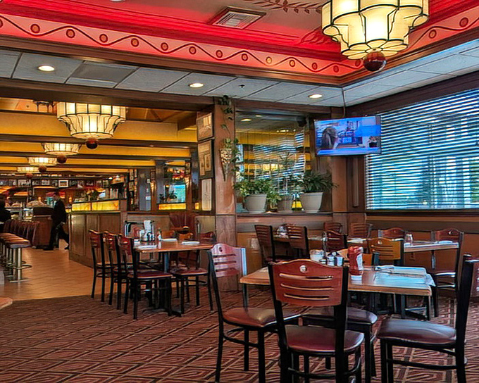 The dining area hums with possibility, each table a stage where countless food dramas have unfolded and countless forks have surrendered.