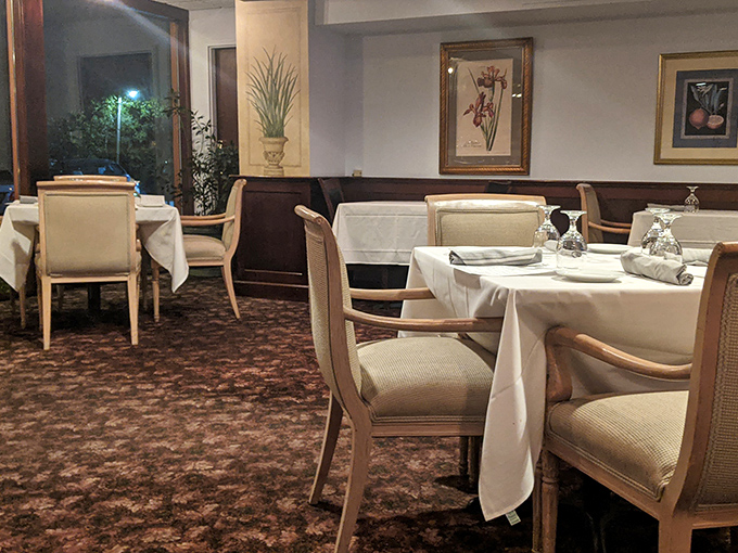 The dining room whispers "anniversary dinner" while still being comfortable enough for a Tuesday night splurge.