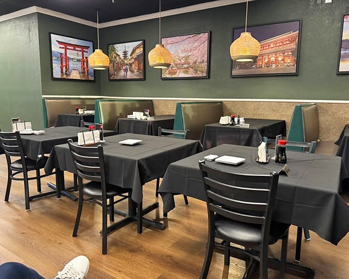 The dining area balances minimalist design with comfort &ndash; those woven pendant lights casting a glow that makes everyone look fabulous.