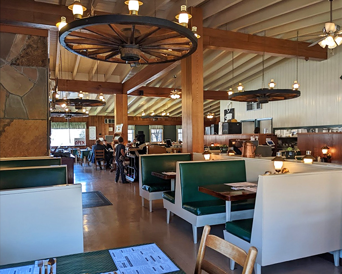 Booths designed for lingering conversations and serious pancake contemplation. The wagon wheels aren't just decor&mdash;they're time machines to simpler days.