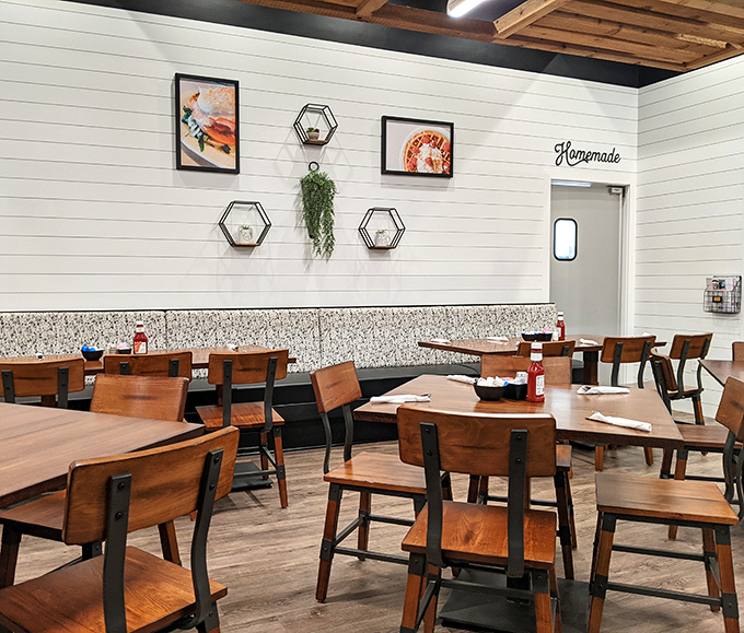 The "Homemade" sign above the kitchen door isn't just decoration&mdash;it's a solemn promise delivered in a dining room that feels like your stylish friend's farmhouse renovation.