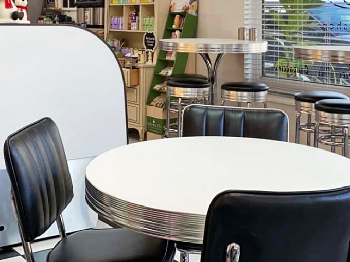 Retro diner tables that have witnessed countless coffee confessions, first dates, and the silent contemplation of "Should I get another cookie?"