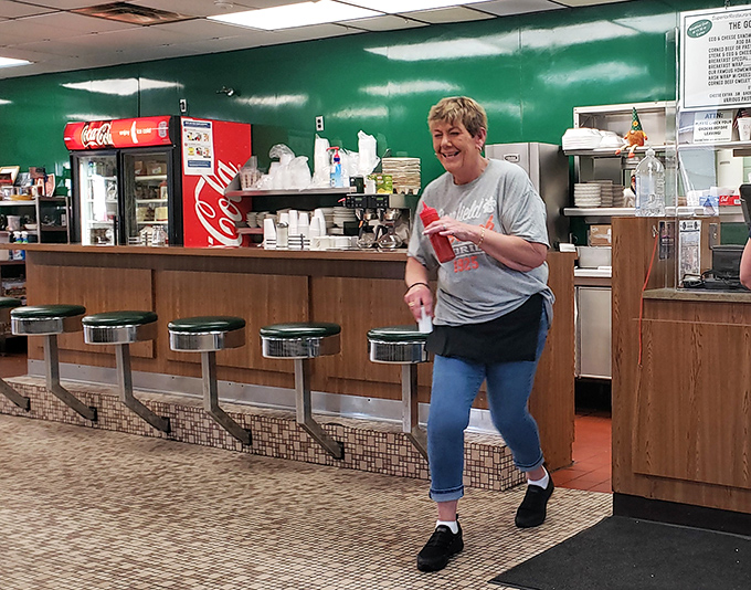 Counter seats offering front-row views of sandwich assembly&mdash;it's dinner theater, but with significantly more corned beef.