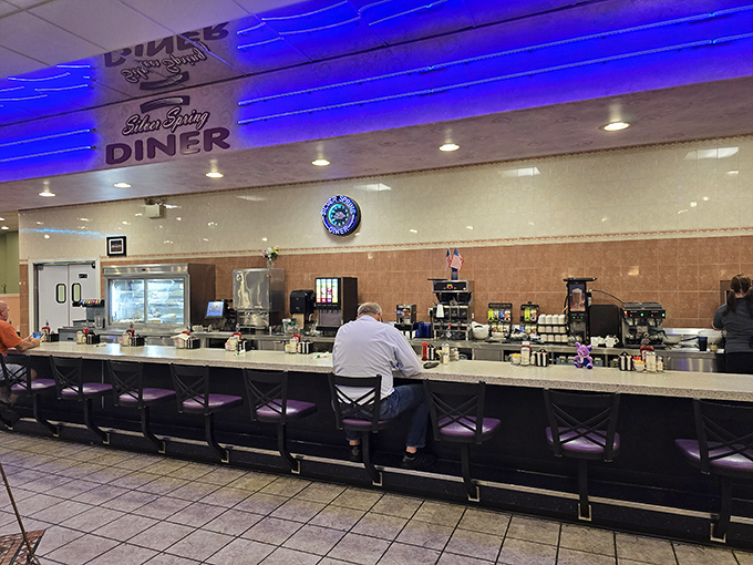 The counter seating&mdash;where diner magic happens. Front-row tickets to the culinary show and the best spot for friendly banter.